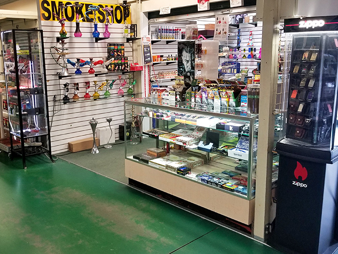 The smoke shop offers colorful water pipes that look more like modern art installations than functional items. A rainbow of options awaits.