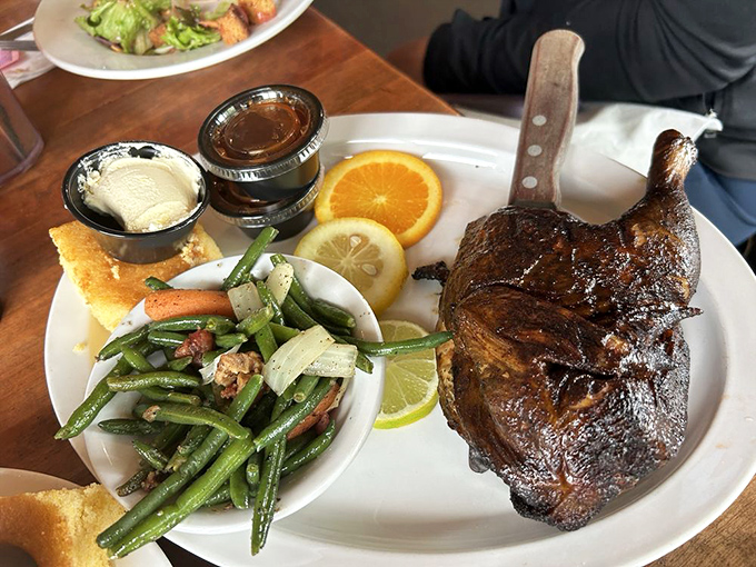 Smoked chicken that's somehow both hearty and delicate, paired with green beans that didn't come from any can.