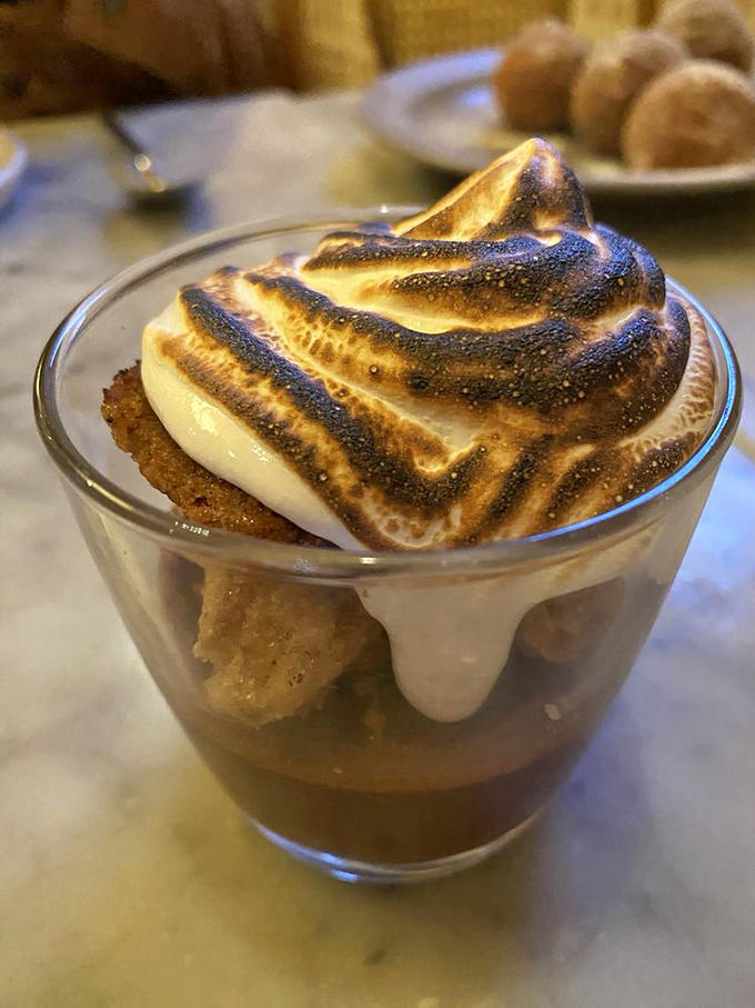 This isn't just dessert; it's a campfire transformed into elegant cuisine, with toasted meringue that would make any s'more jealous.