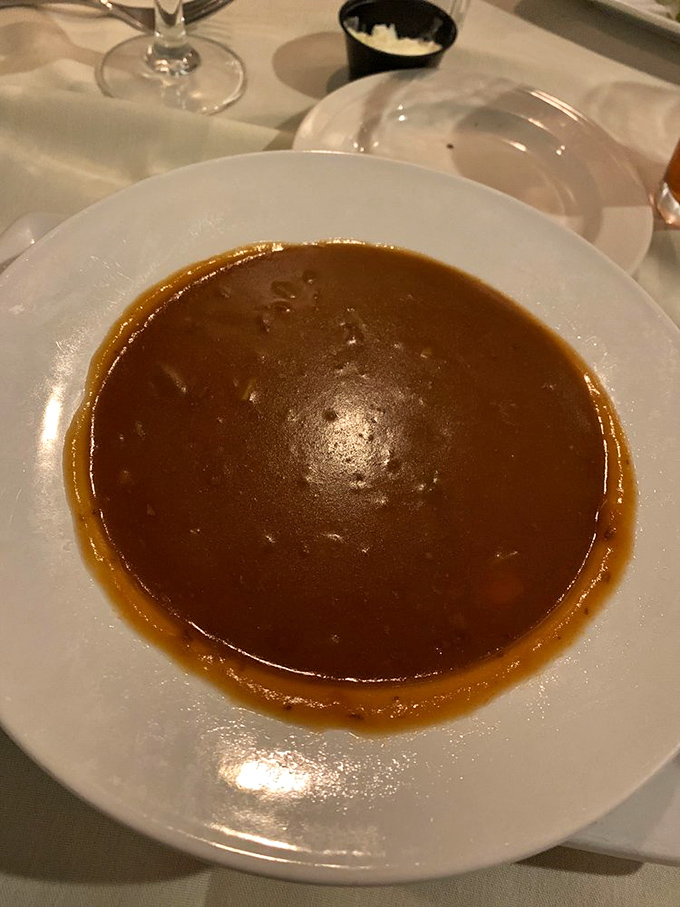 A soup so rich and velvety, it makes you wonder if they've been simmering it since the building was constructed.