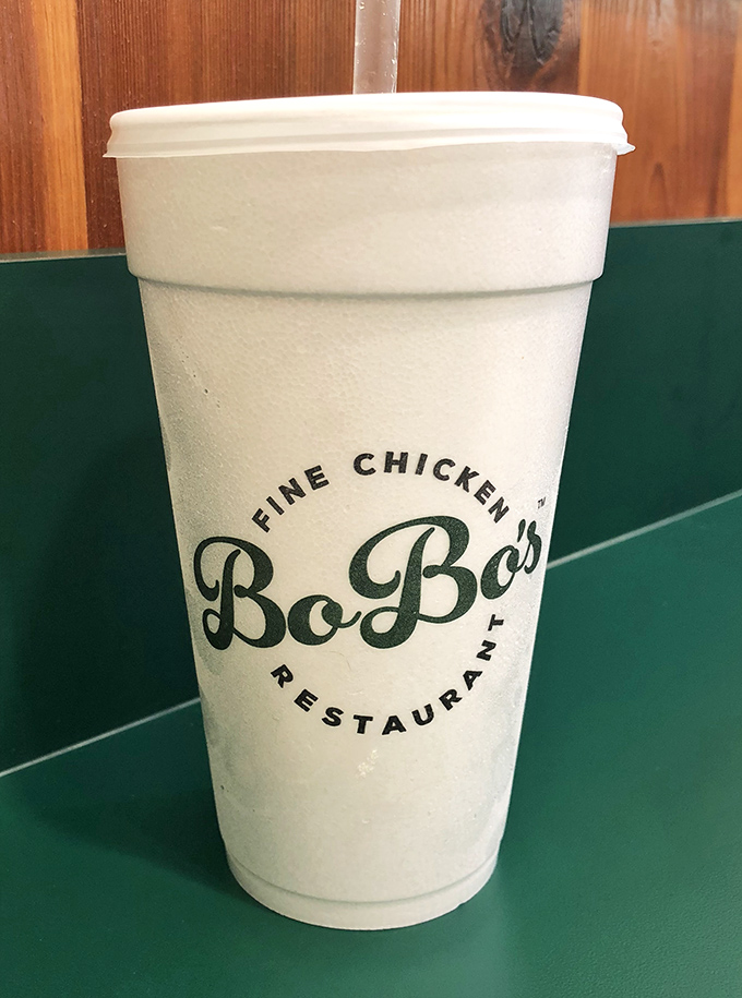 Even the cups at BoBo's have personality. This isn't just a beverage container; it's your ticket to wash down chicken heaven.