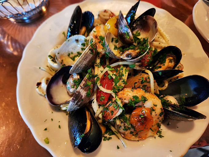 Spaghetti ai Frutti Di Mare&mdash;where the shellfish outnumber the pasta strands in a glorious seafood-to-carb ratio.