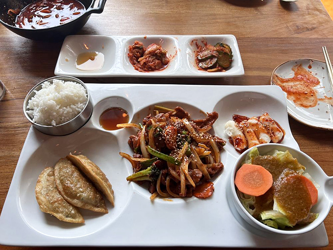 This isn't just a meal, it's a flavor geography lesson &ndash; each compartment offering a different region of Korean culinary brilliance.