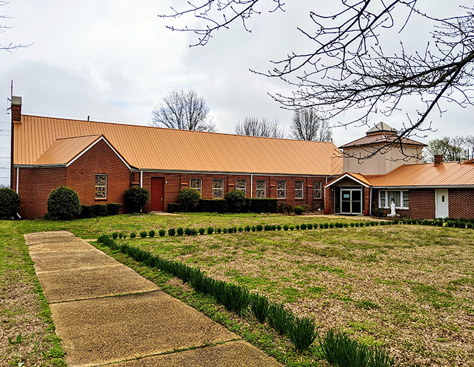 St. Cecilia's Catholic Church offers architectural beauty and spiritual comfort. Its brick exterior and manicured grounds reflect the care of generations of parishioners.