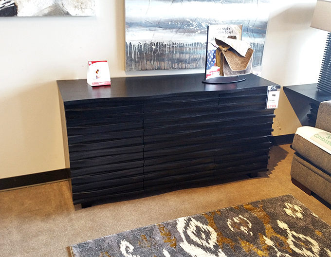 This sleek black dresser could organize your life&mdash;or at least your socks. Minimalist design that works in any bedroom.