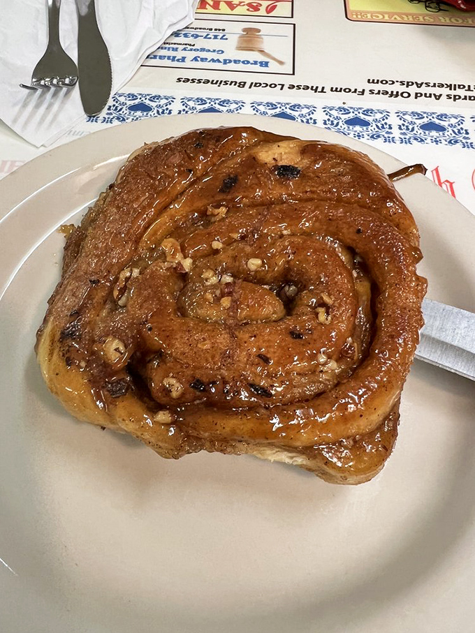 A cinnamon roll that doesn't care about your diet plans. The kind of morning indulgence that makes Monday feel like Saturday.