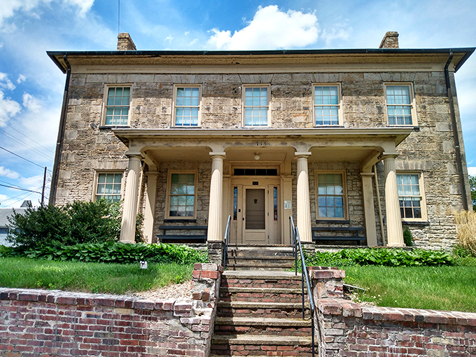 The Stone Academy whispers tales from another era. Those walls have seen more American history than most history textbooks actually cover.