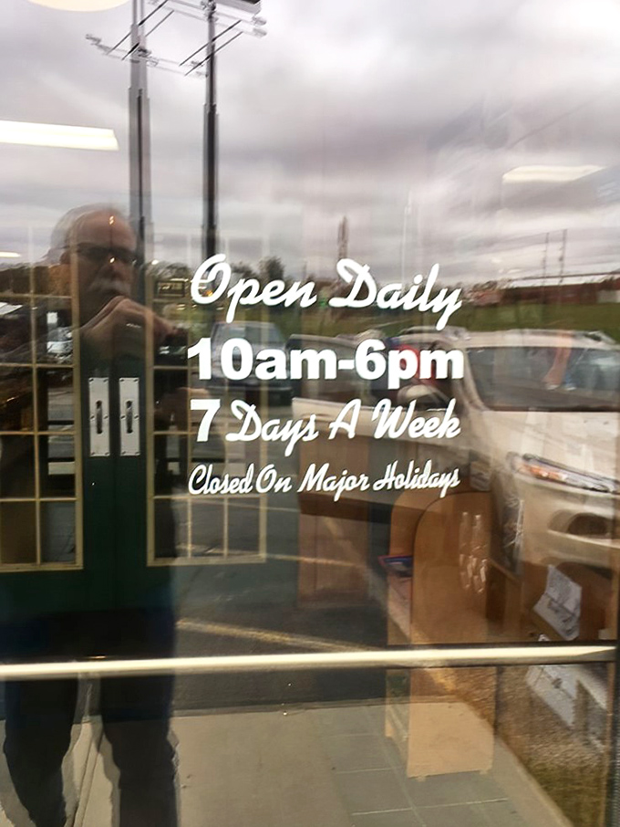 "Open Daily" promises the door, tempting passersby with the siren call of vintage treasures seven days a week. Resistance is futile.