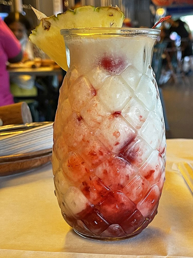 A pineapple-garnished tropical concoction in a diamond-patterned glass&mdash;like Florida vacation vibes distilled into liquid form.