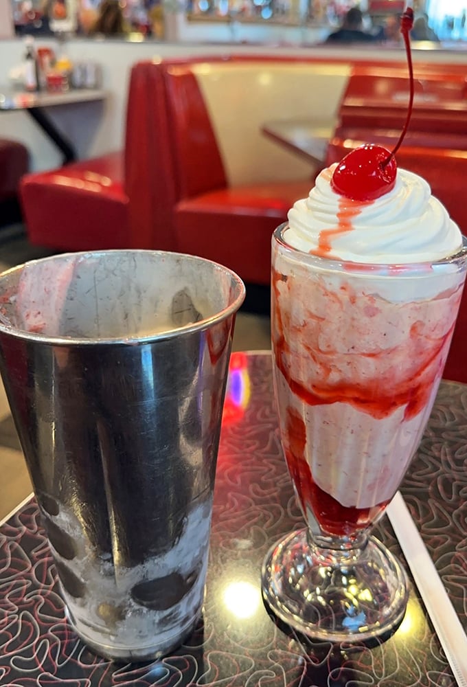 A strawberry shake that belongs in a museum of American classics&mdash;tall, proud, and topped with a cherry that's more than just decoration.