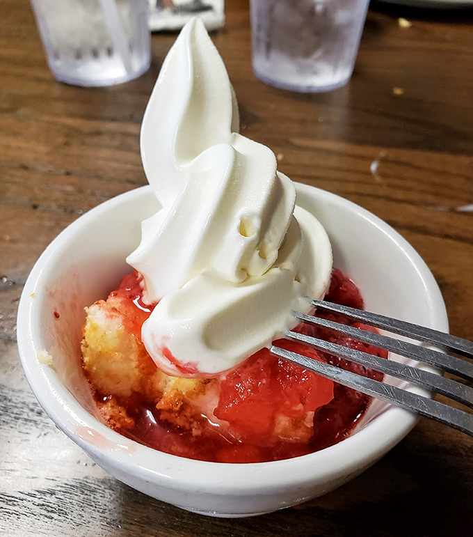 Strawberry shortcake that understands its mission: to deliver maximum joy with minimum pretense. That whipped cream peak deserves its own topographical map.