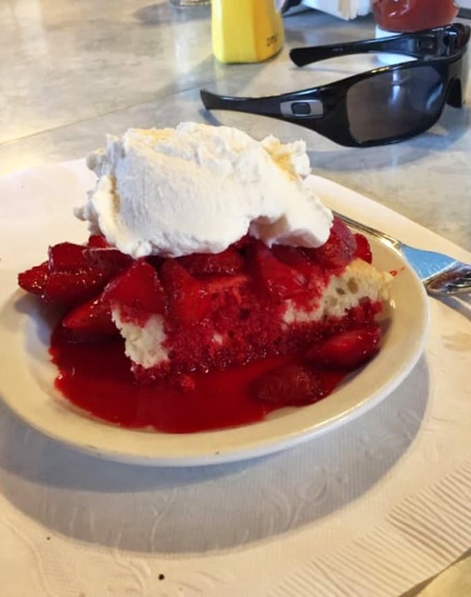 Strawberry shortcake that makes you question why anyone bothers with fancy desserts when this red and white masterpiece exists in the world.