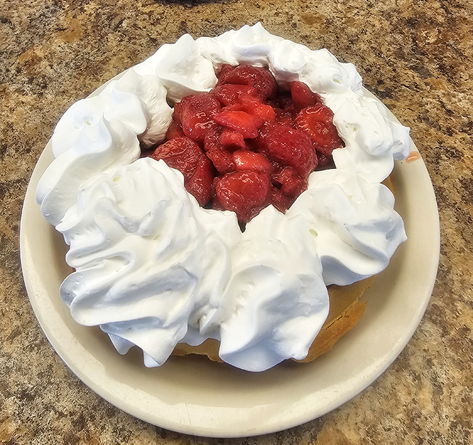 A strawberry shortcake that's more whipped cream than anything else, and nobody's complaining. The strawberries are just there to make you feel virtuous about your dessert choice.