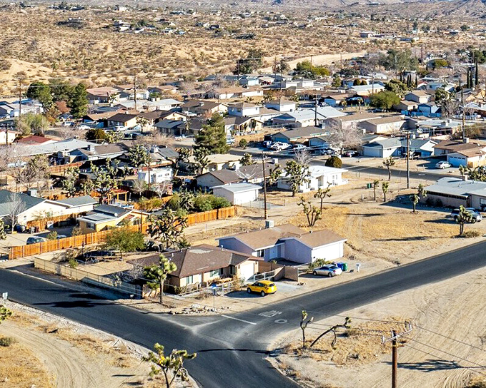 Desert neighborhoods with character. Solar panels glint in the sunshine, proving Yucca Valley residents are as practical as they are appreciative of their sun-drenched surroundings.