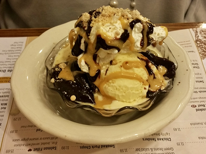 Ice cream architecture at its finest&mdash;this sundae demonstrates why some of life's greatest pleasures come in glass dishes with multiple toppings and zero apologies. 