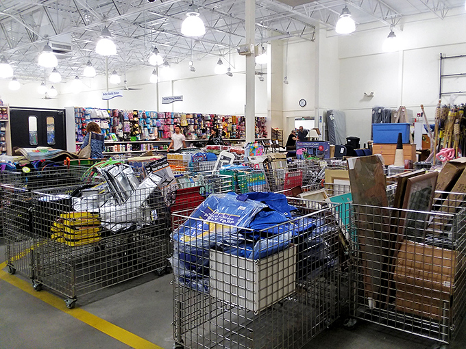 Behind the scenes: Goodwill's sorting area reveals the constant flow of donations that keeps the treasure hunt fresh daily.