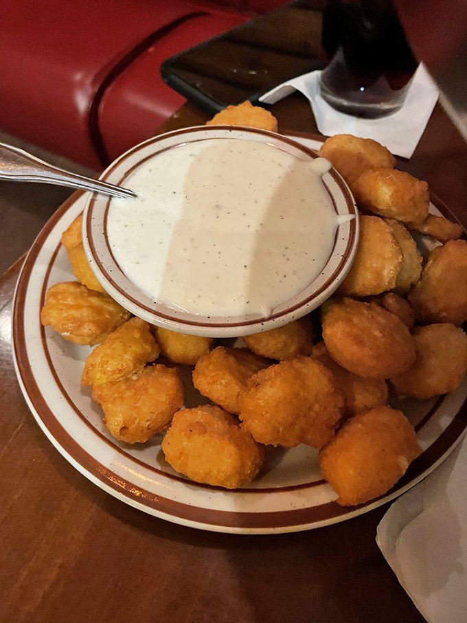 Golden corn nuggets surrounding a creamy dipping sauce&mdash;like little nuggets of sunshine that somehow taste even better than they look.