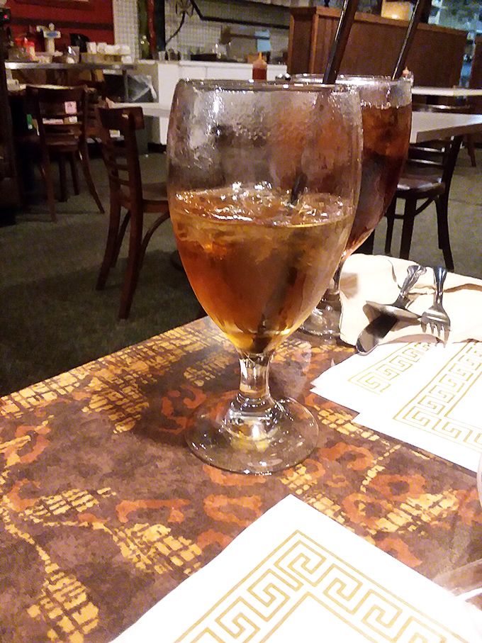 Sweet tea in a proper glass goblet &ndash; the unofficial champagne of the South, served with the respect it deserves.