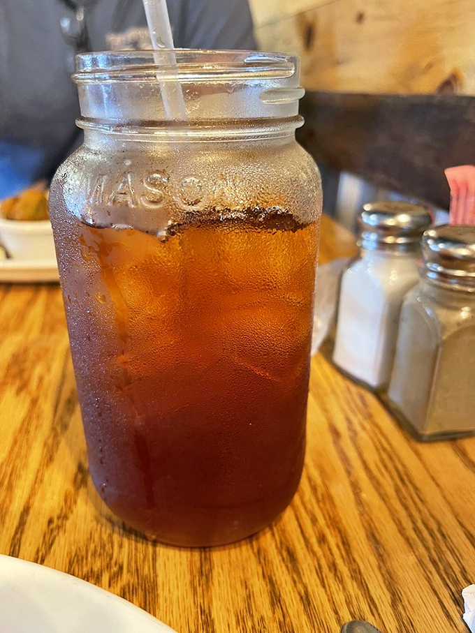 Sweet tea served in a Mason jar&mdash;because in Tennessee, proper hydration is a matter of cultural heritage.