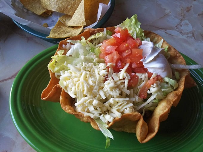 This taco salad bowl isn't just edible &ndash; it's architectural genius that answers the eternal question: "Why can't all dishes be made of fried tortilla?"