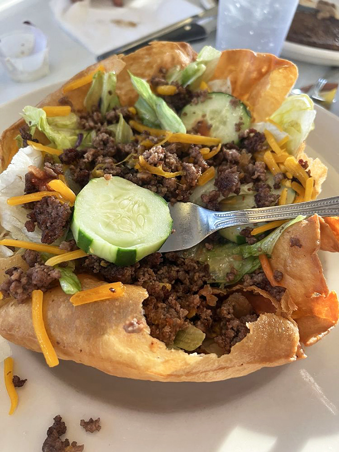 A taco salad that's actually a crispy edible bowl filled with seasoned beef and fresh veggies. Whoever invented this deserves a Nobel Prize.
