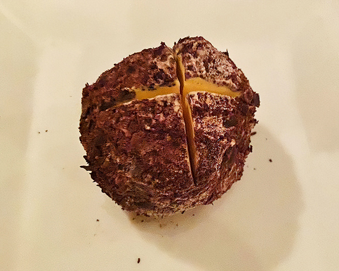 This chocolate-dusted sphere isn't just dessert, it's edible architecture with a sweet secret inside.
