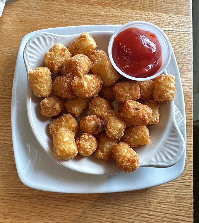 Tater tots&mdash;childhood nostalgia upgraded for your adult palate. Crispy golden nuggets that prove some pleasures never outgrow their appeal.
