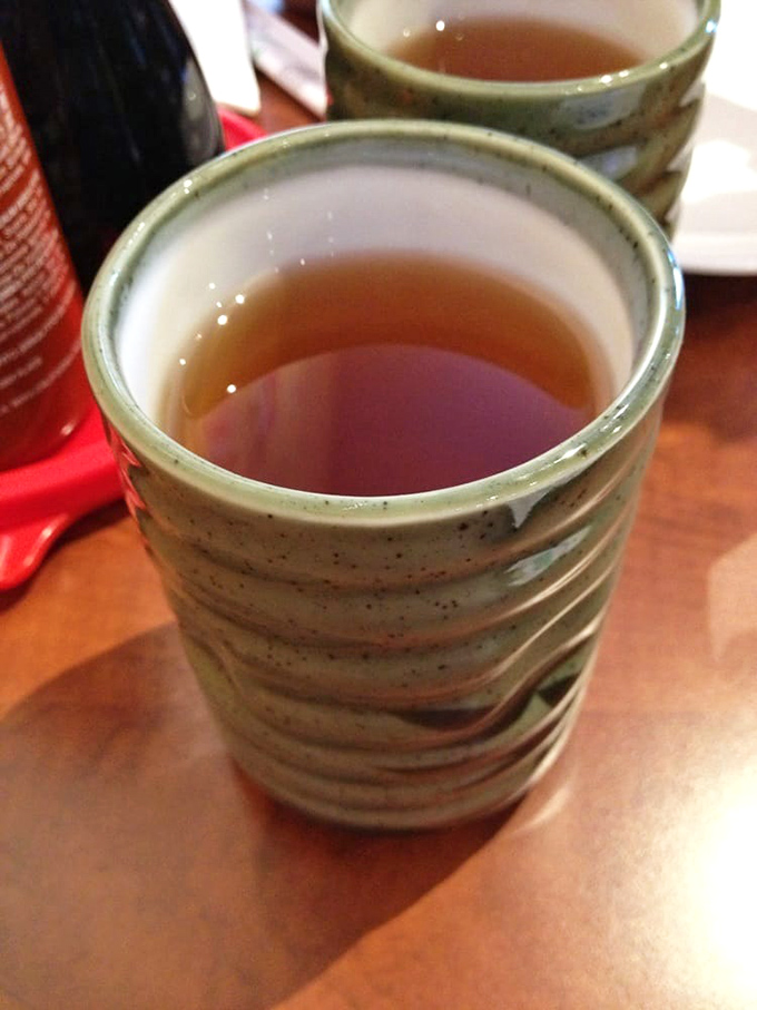 Hot tea served in traditional cups &ndash; the perfect palate cleanser between bites or the ideal companion while waiting for those wings.
