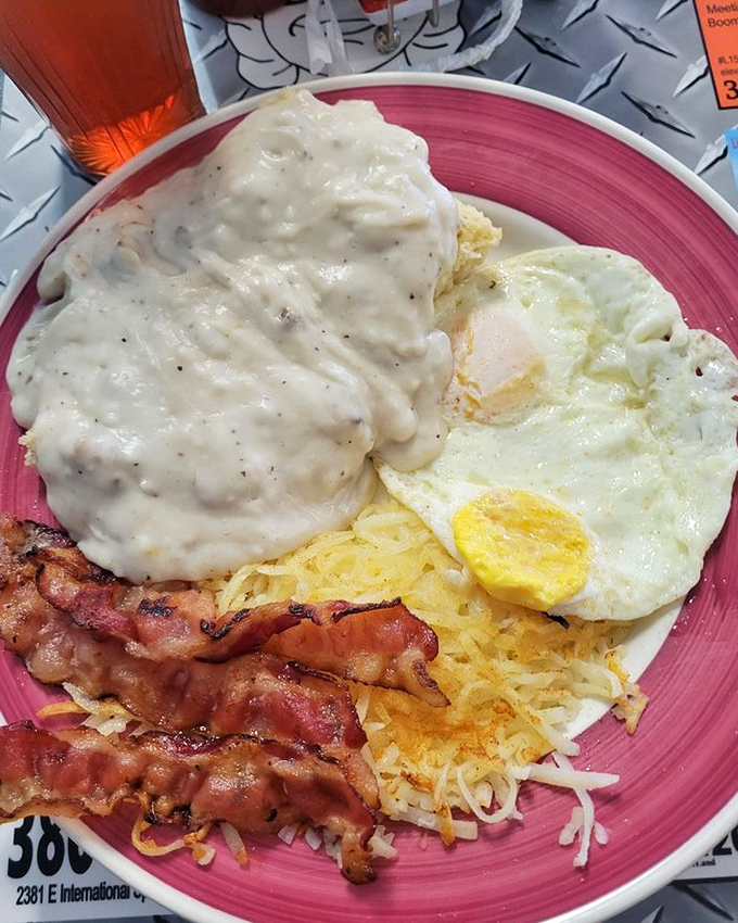 Breakfast with attitude&mdash;crispy bacon, eggs, and hash browns under a blanket of country gravy that's practically tucking you in.