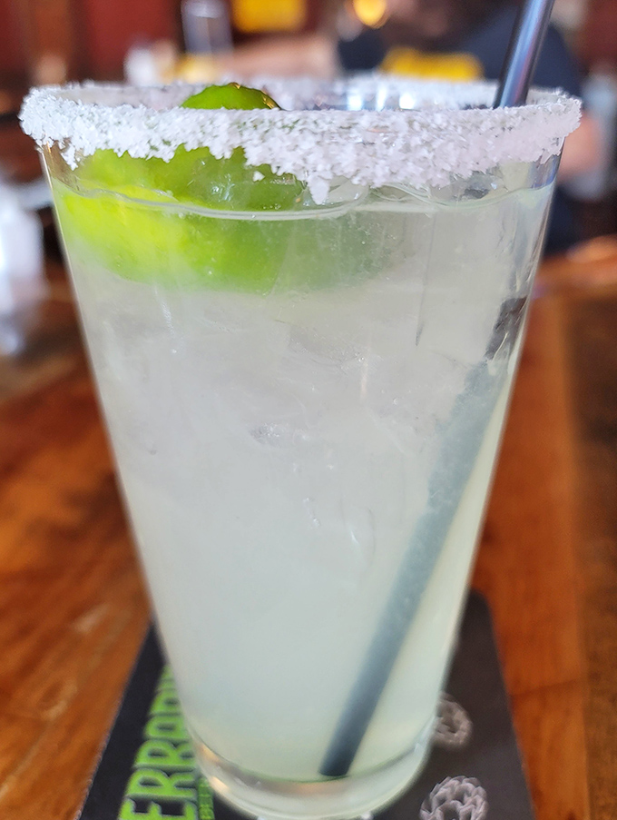 A margarita with a salt rim so perfect it makes you wonder if there's a tiny artist with steady hands working behind the bar.