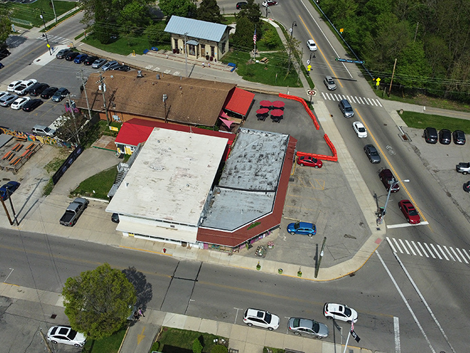 The bird's-eye view reveals a community where every building contributes to one beautiful, cohesive small-town symphony.