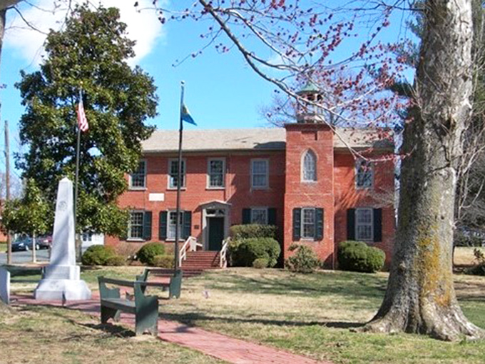 Odessa's Town Hall stands as the community's anchor, with its brick fa&ccedil;ade and dignified presence. Even small-town government deserves impressive architecture.