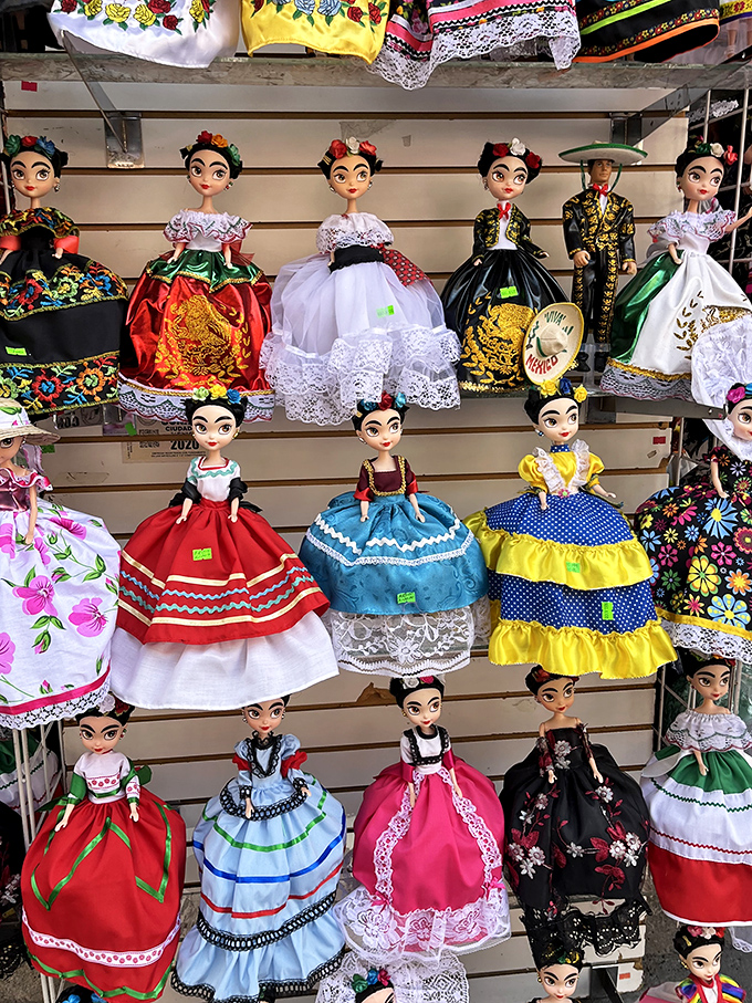 Frida dolls in traditional dress stand at attention, each with personality to spare. Miniature cultural ambassadors waiting to grace your bookshelf.