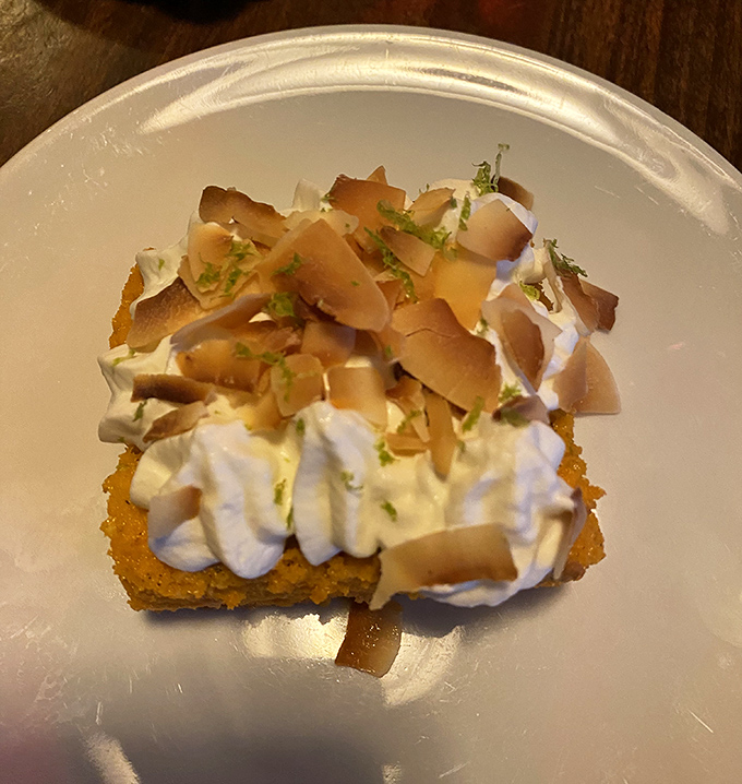 This dessert doesn't just end the meal&mdash;it provides closure in the most delightful way. Whipped cream and what appears to be candied citrus create sweet harmony.