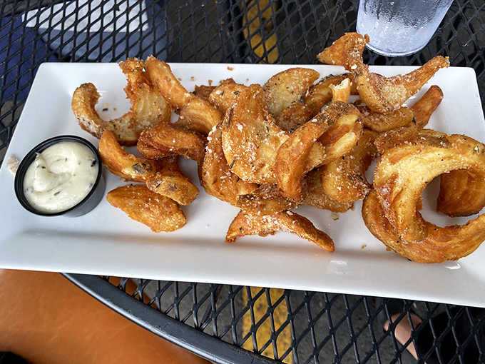 These aren't just onion rings &ndash; they're golden halos of crispy perfection that make you wonder why anyone would ever choose regular fries.