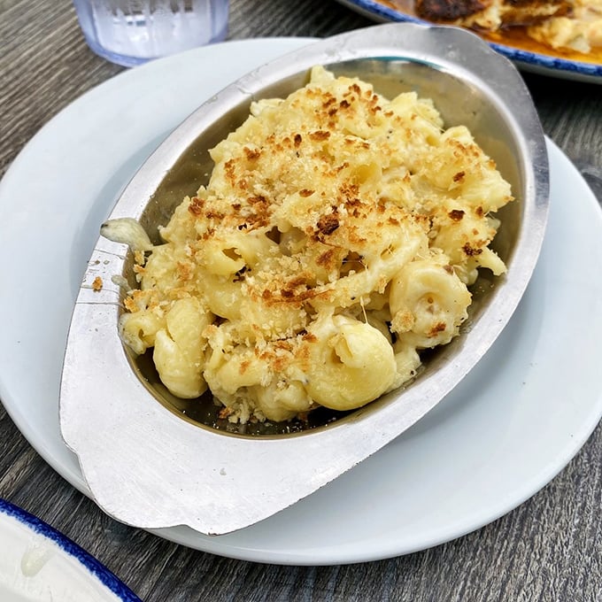 Truffle mac and cheese with a golden crust that makes the perfect cracking sound when your fork breaks through. Music to your ears, magic for your mouth.