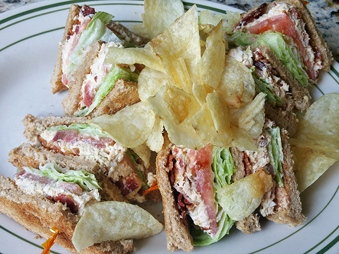 A tuna club so perfectly constructed, it could teach a masterclass in sandwich architecture.