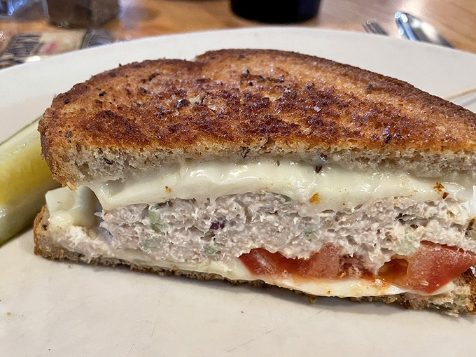 The perfect tuna melt &ndash; where bread meets griddle in a golden-brown romance that makes you forget all about those fancy $18 sandwiches elsewhere.
