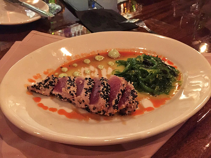Sesame-crusted tuna, rare in the center, swimming in a savory broth that would make Neptune himself jealous.