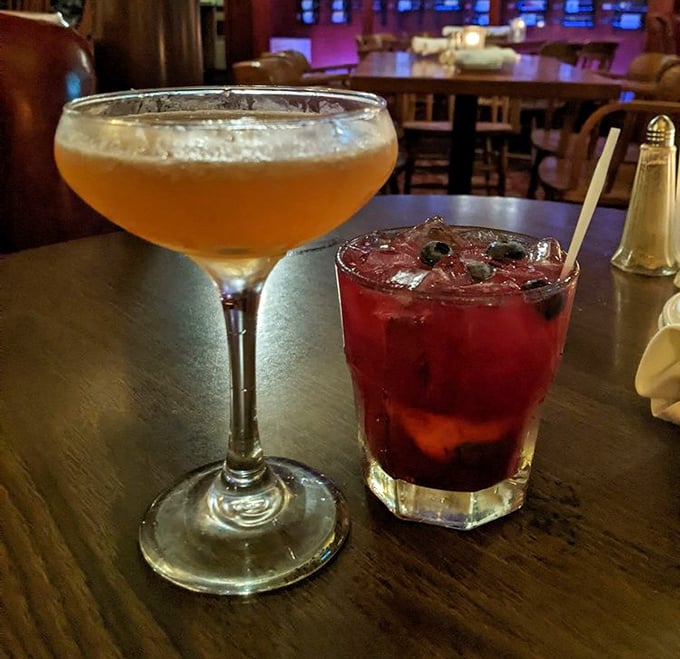 Cocktails that look like liquid jewelry&mdash;one amber, one ruby&mdash;both promising an evening where worries dissolve faster than the ice.
