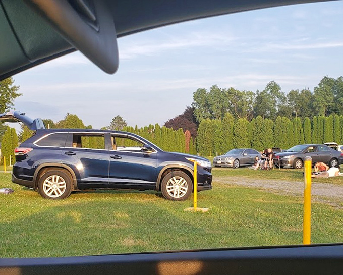 The view from your windshield—better than any reclining theater seat. Nature provides the ceiling, your car provides the comfort.