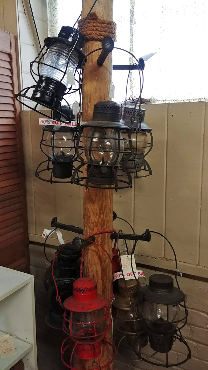 These railroad lanterns once guided trains through the darkness. Now they guide decorators seeking authentic vintage charm for modern homes.