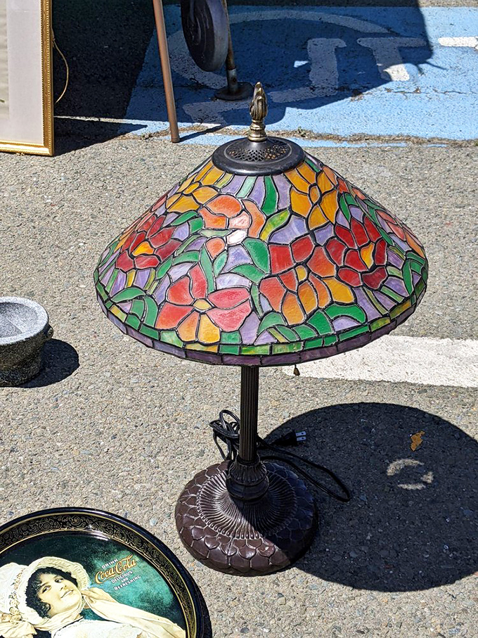 A Tiffany-style lamp casts jewel-toned light even in broad daylight. Your reading nook has been waiting its whole life for this.