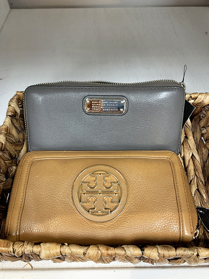 Designer wallets that prove good taste doesn't require emptying your bank account. That Tory Burch is practically winking at you.