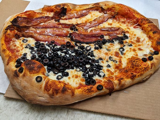 Bacon and olives create the sweet-salty-savory trifecta that pizza dreams are made of—a flavor combination worthy of scientific study.