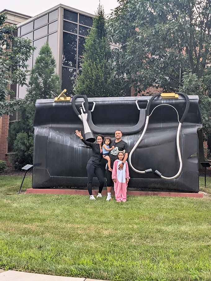 Family photos are instantly upgraded when you pose with a doctor's bag big enough to treat Godzilla's seasonal allergies.