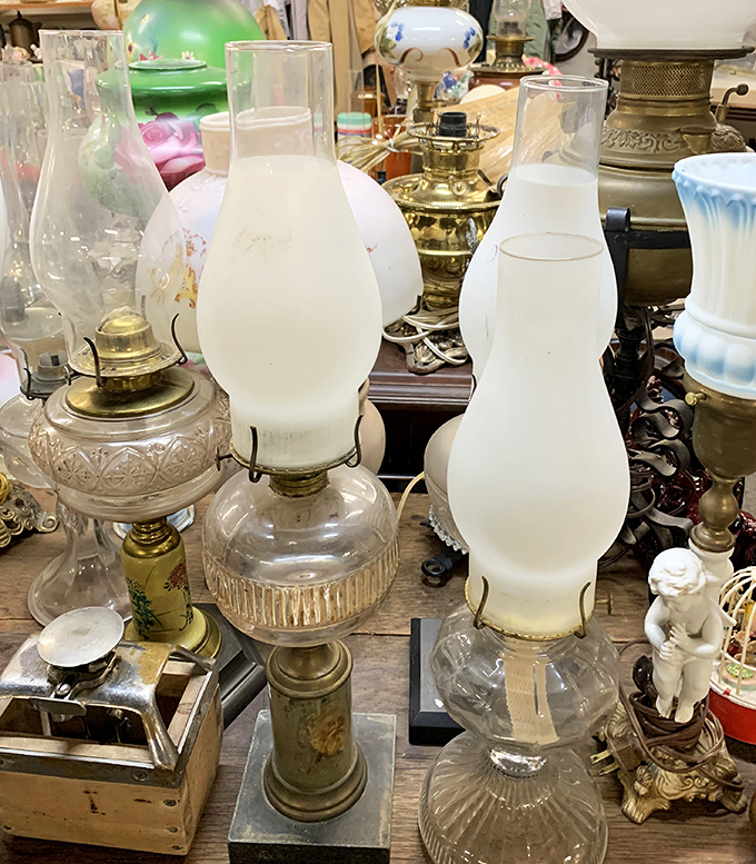 These oil lamps once illuminated someone's late-night reading or family dinner—now they're waiting to cast their warm glow in your home.