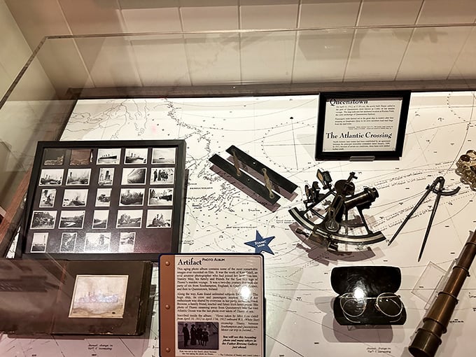 Maps, instruments, and navigation tools tell the story of a journey planned with precision but ultimately altered by fate and nature.