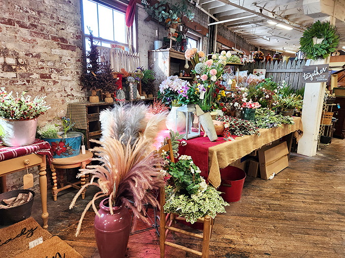Not just flowers, but a botanical explosion of color that transforms this corner into what feels like a secret garden hidden among the antiques.