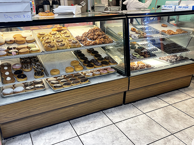 The display case &ndash; or as I call it, "The Museum of Delicious Decisions." Each shelf offers a different path to happiness.